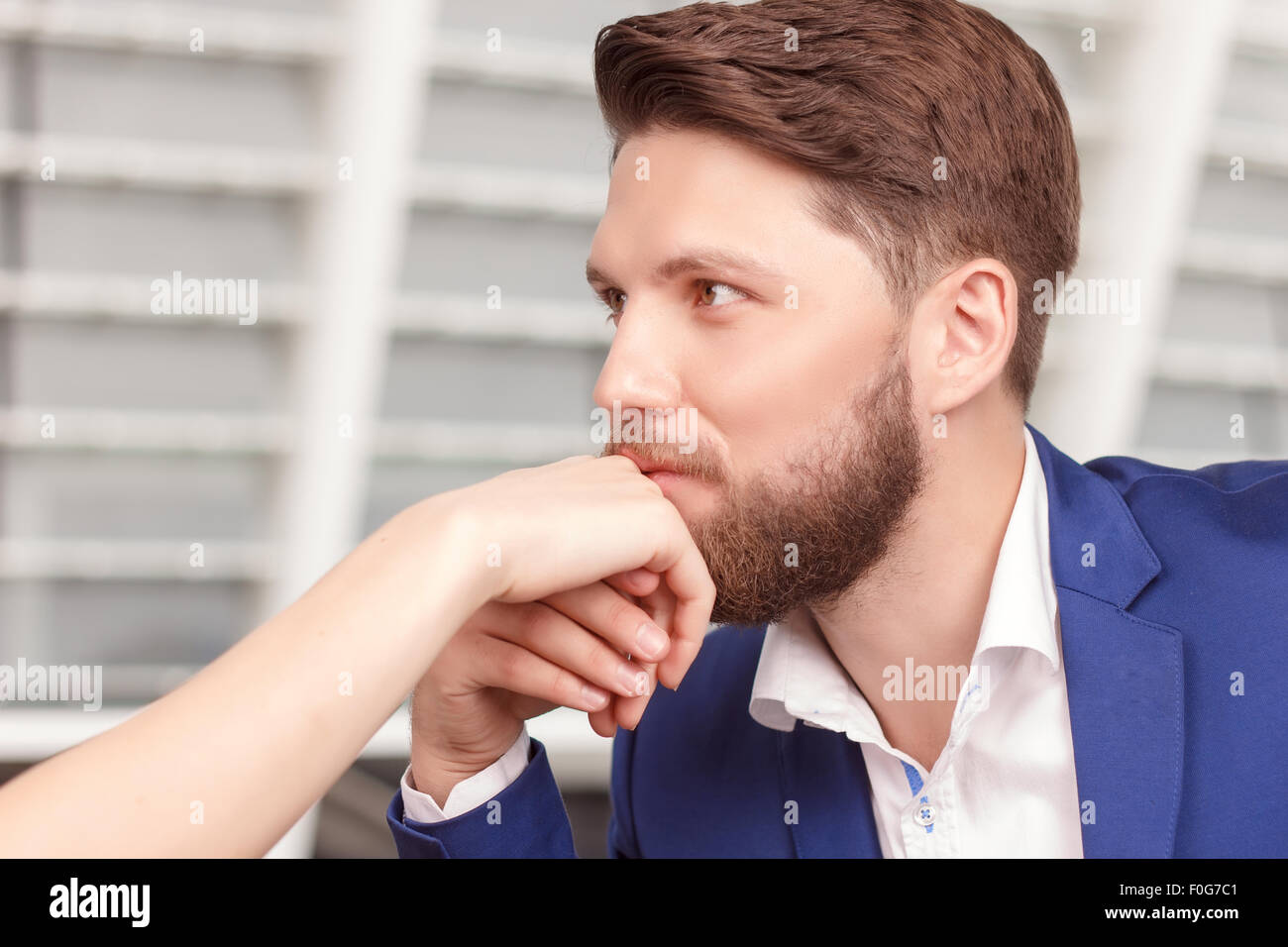 Handsome man kissing hand of his girlfriend Stock Photo - Alamy