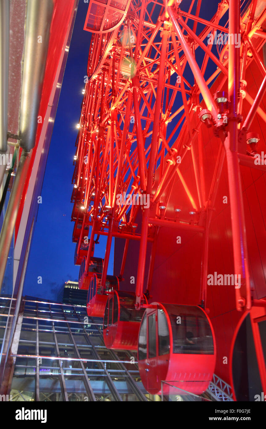 Red Ferris wheels in night time at Osaka, Japan Stock Photo - Alamy