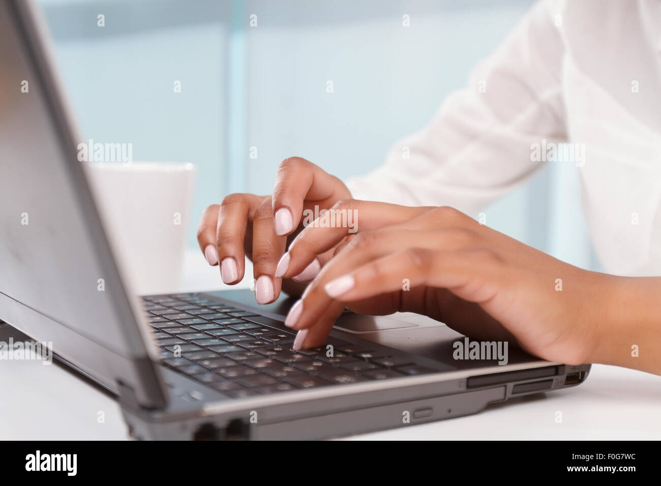 Close up of typing woman Stock Photo - Alamy