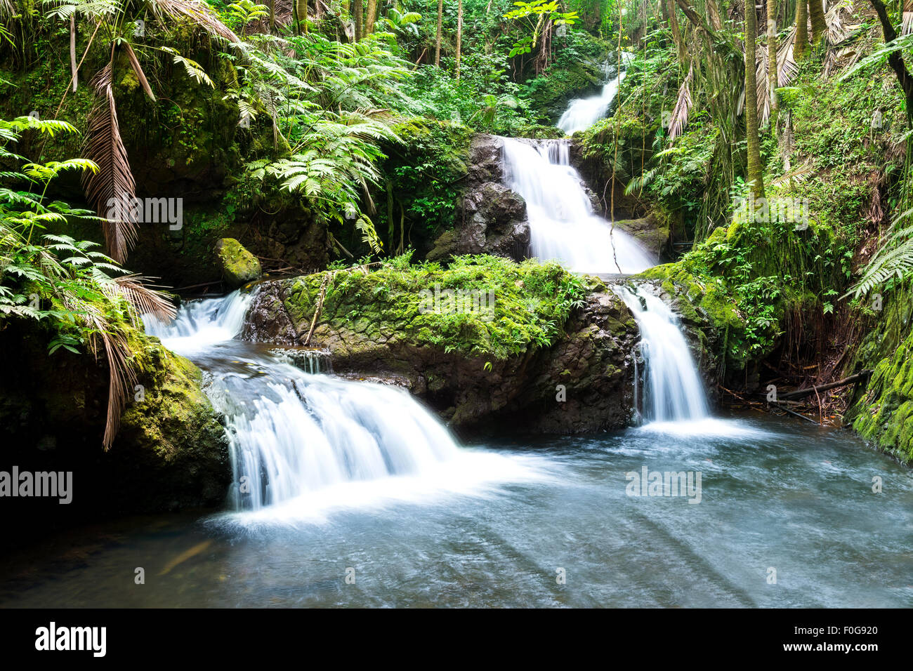 Beautiful waterfall in Hawaii fed by frequent rainfall forms cascading ...