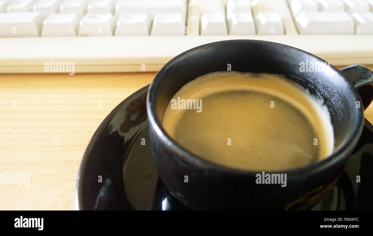delicious espresso break , relax pause at computer desk Stock Photo - Alamy