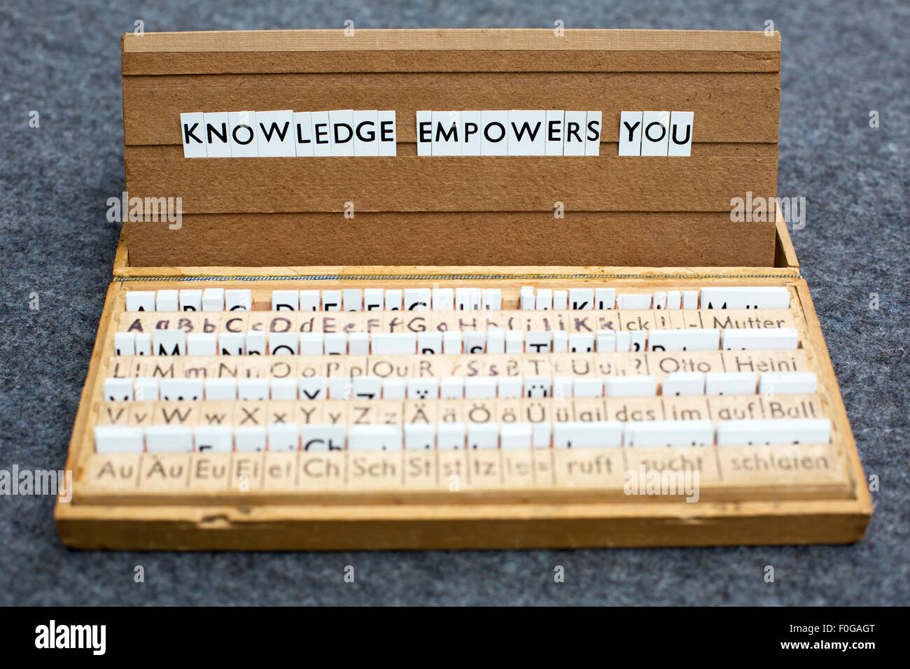 the words "knowledge empowers you?" on an old school letter box Stock ...