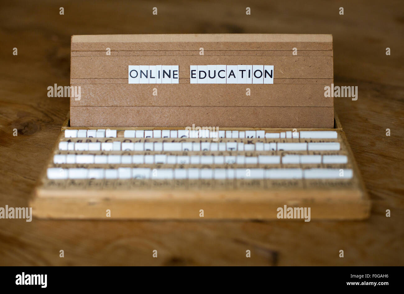 the words "online education" on an old school letter box Stock Photo ...