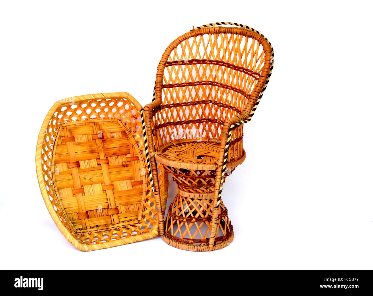 Wicker objects a chair and a basket craft works hi-res stock ...