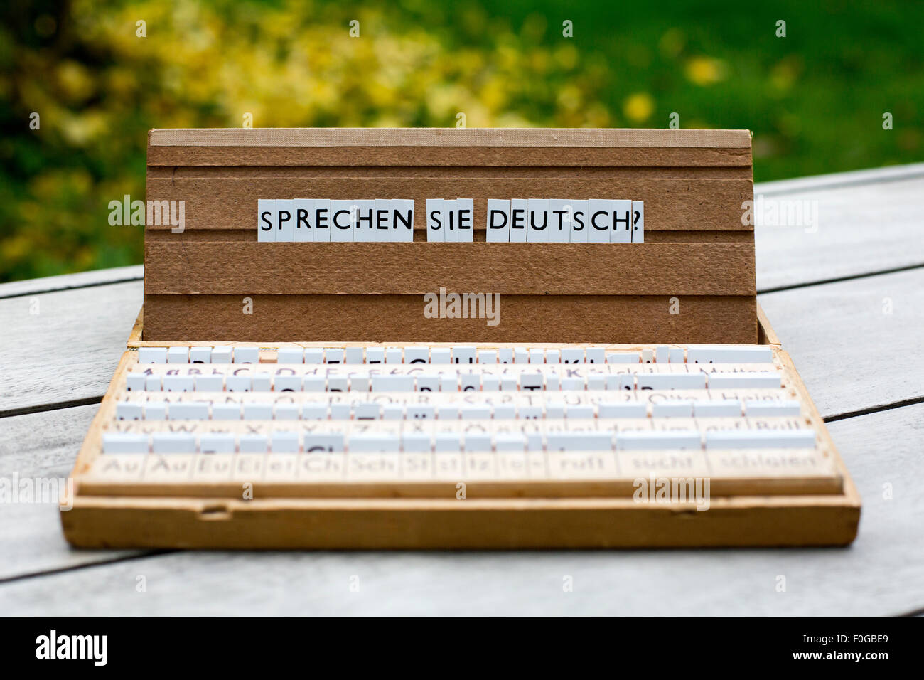 a letter box with the text: "Sprechen Sie deutsch?" (Do you speak ...