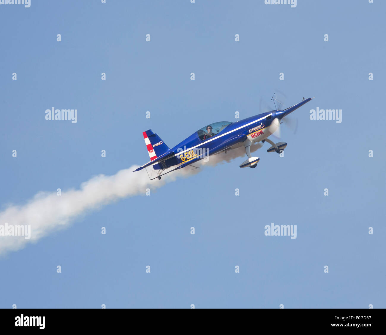 Extra 300S (G-EXIL) a fully aerobatic monoplane aircraft flying at the ...