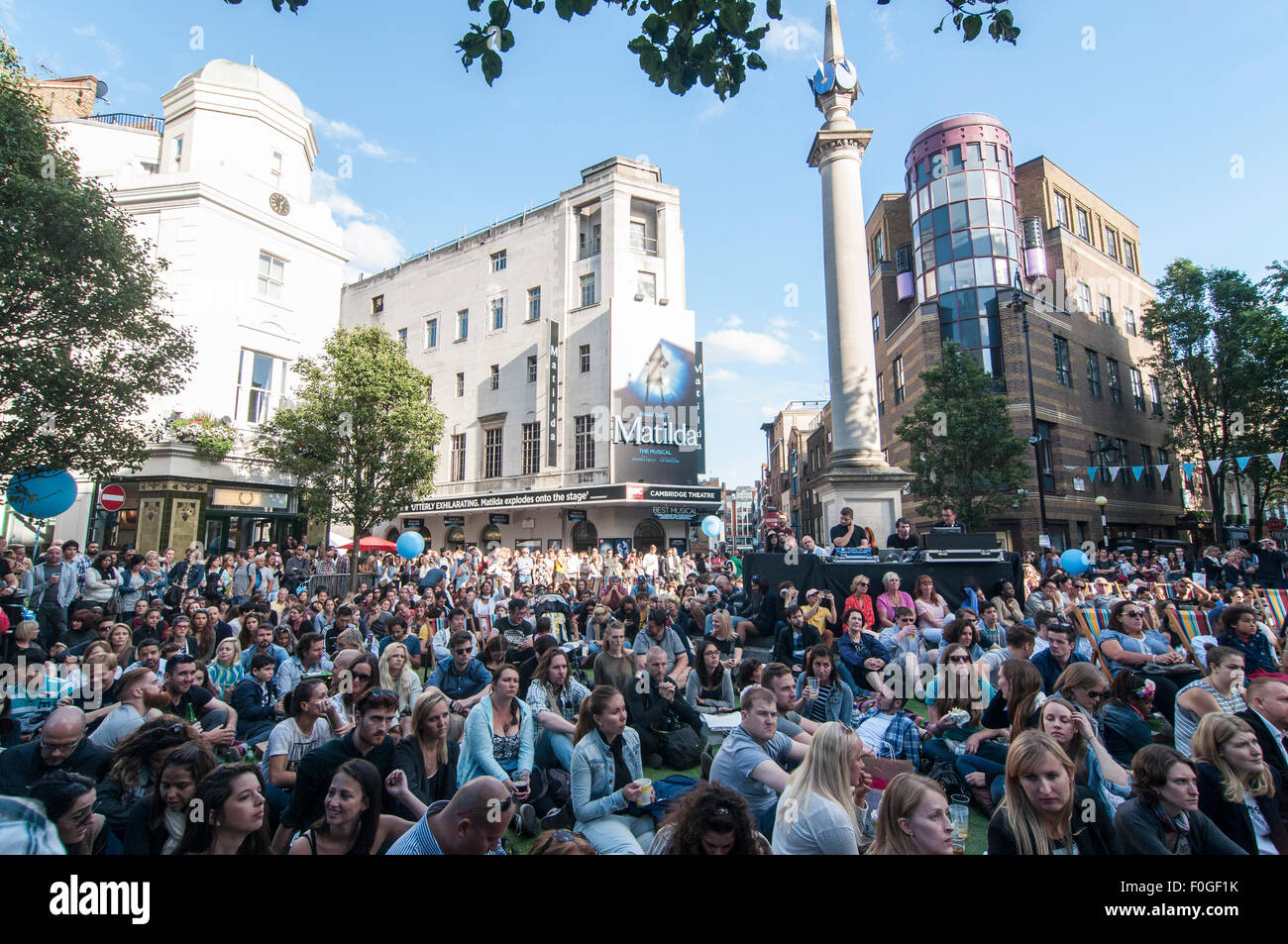 London, UK. 15 August 2015. Large crowds gather in the sunshine to ...