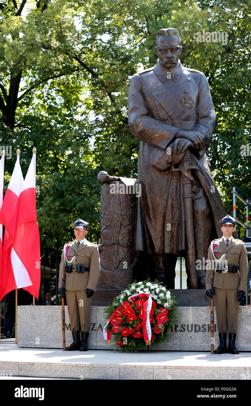 Two Polish soldiers stand by the statue of Józef Pi?sudski, a famed ...