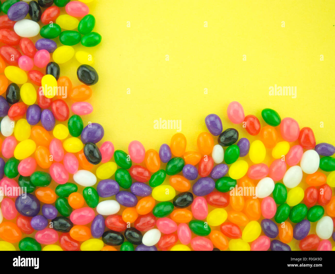 Frame and background made of colorful jelly beans Stock Photo - Alamy