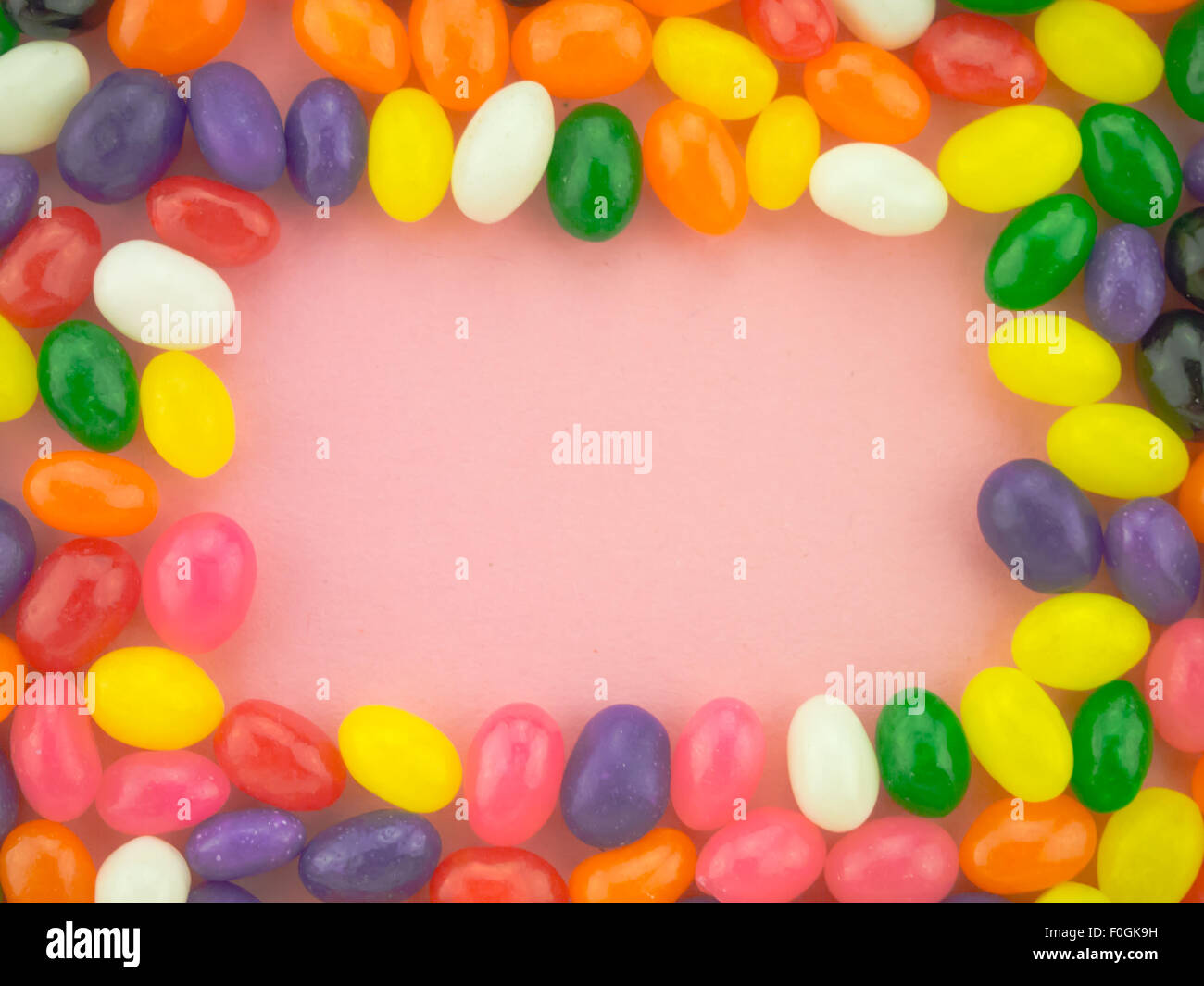Frame and background made of colorful jelly beans Stock Photo - Alamy