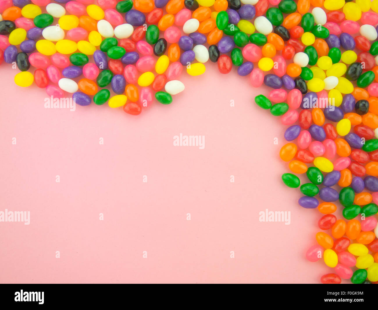 Frame and background made of colorful jelly beans Stock Photo - Alamy