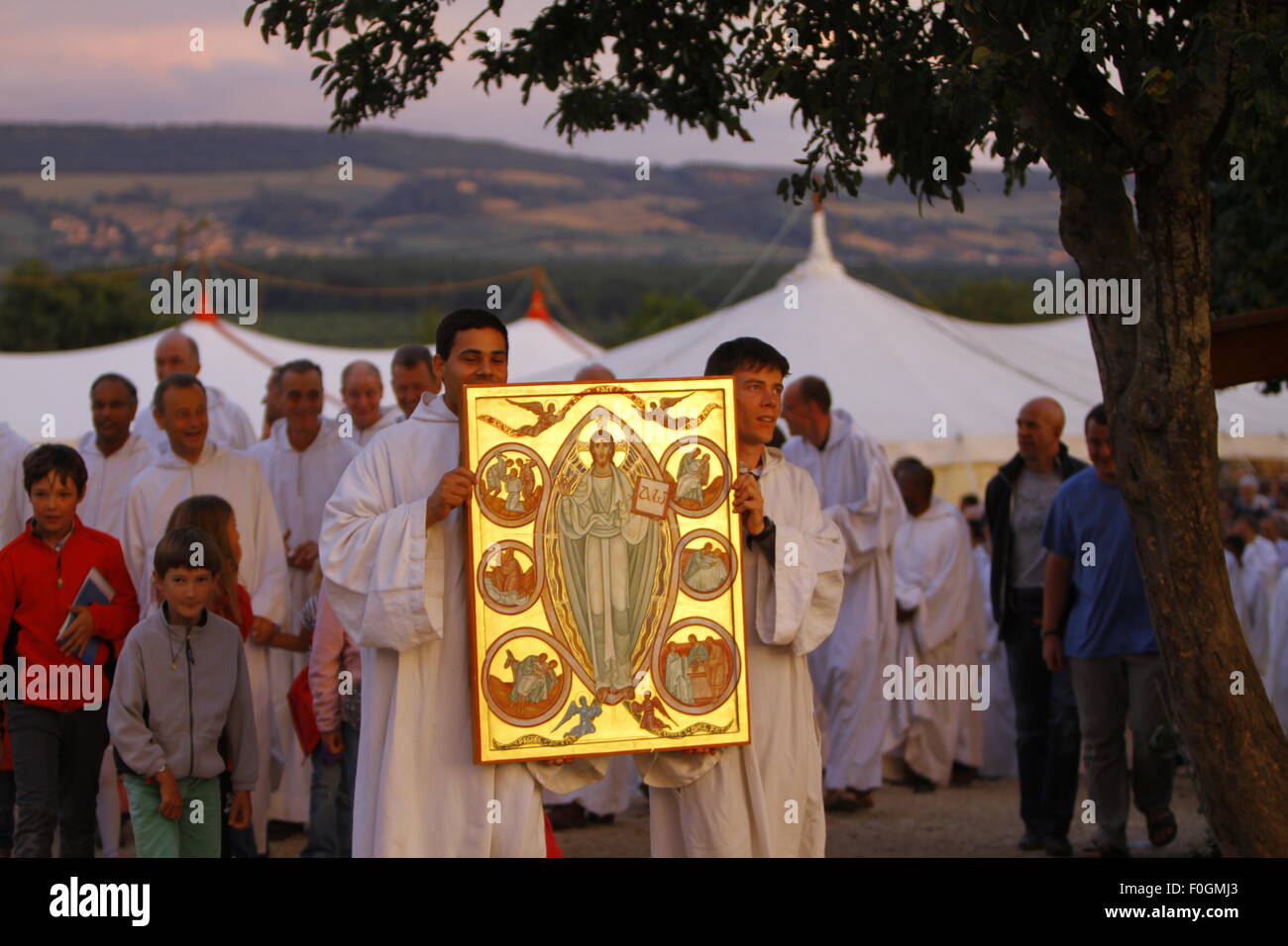 Burgundy, France. 15th Aug, 2015. The Icon of Mercy is carried in a ...