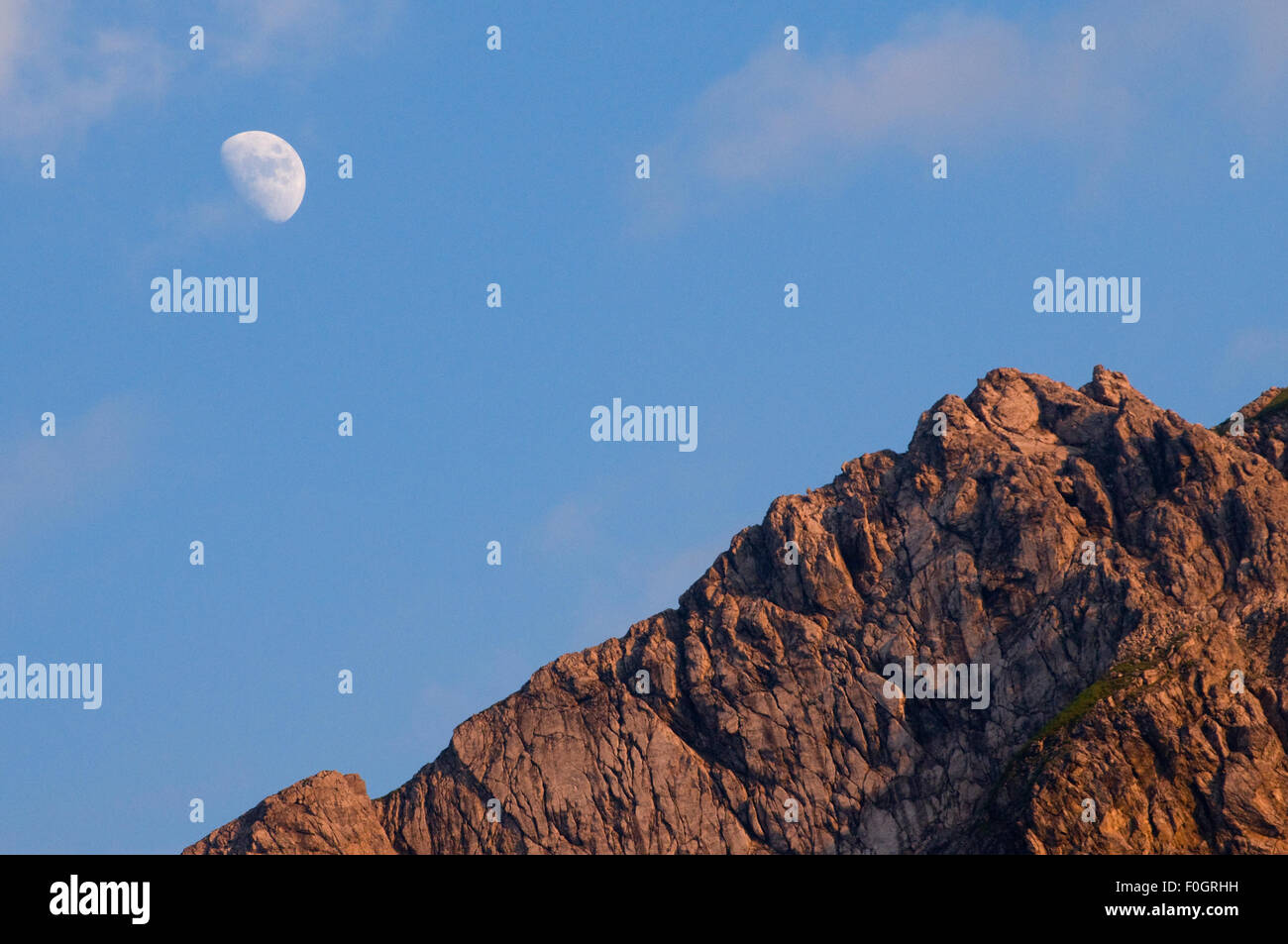 Moon over the Augstenberg, Liechtenstein, July 2009 Stock Photo - Alamy
