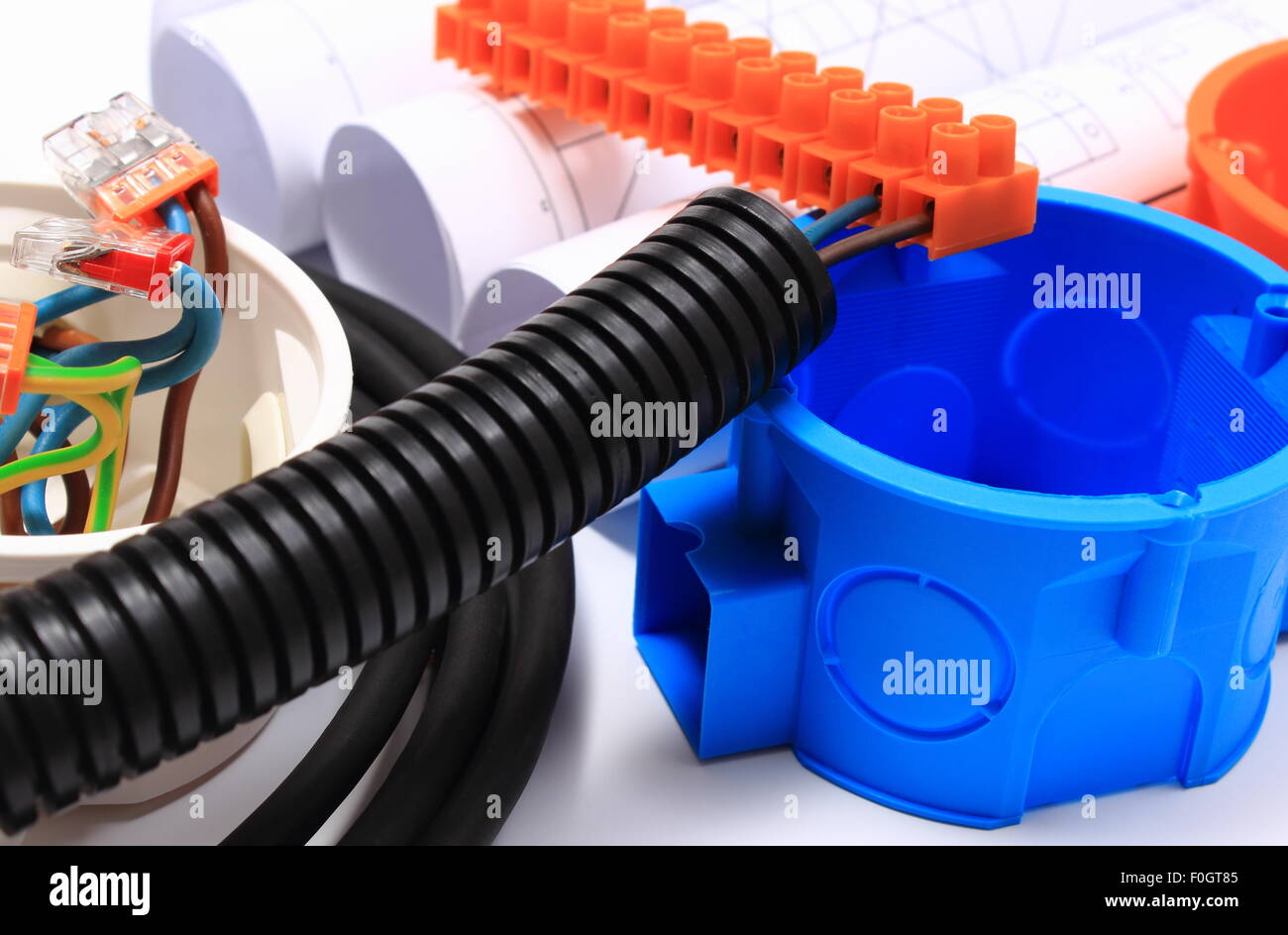 Components for use in electrical installations and rolls of electrical ...