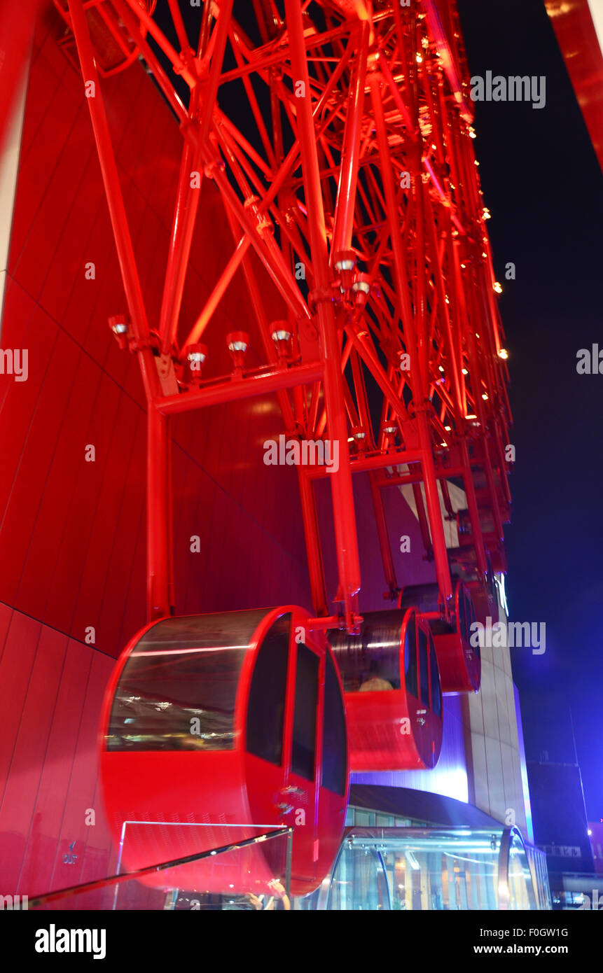 Red Ferris wheels in night time at Osaka, Japan Stock Photo - Alamy
