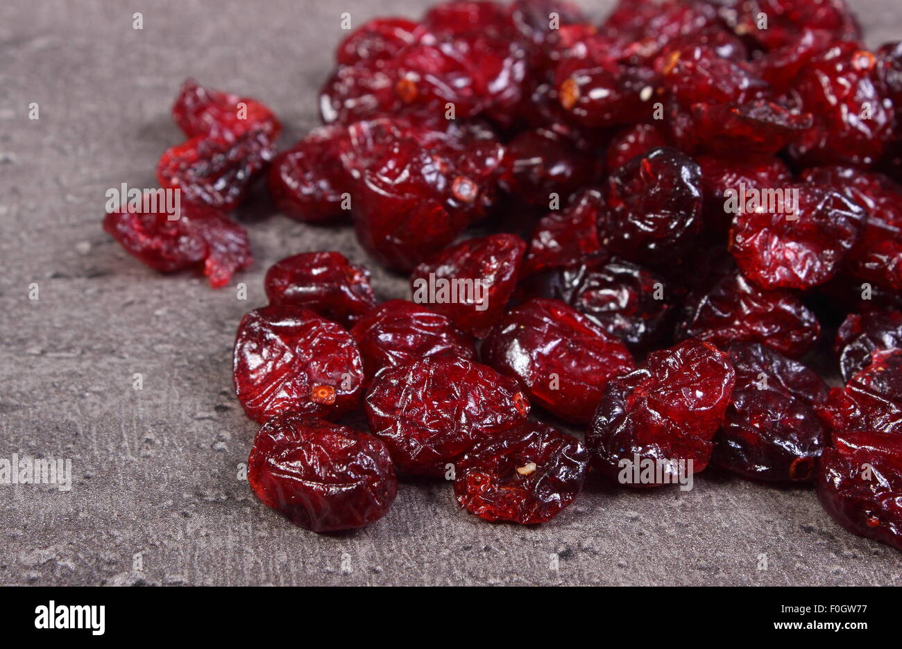 Heap of red cranberries on structure of concrete, concept for healthy ...