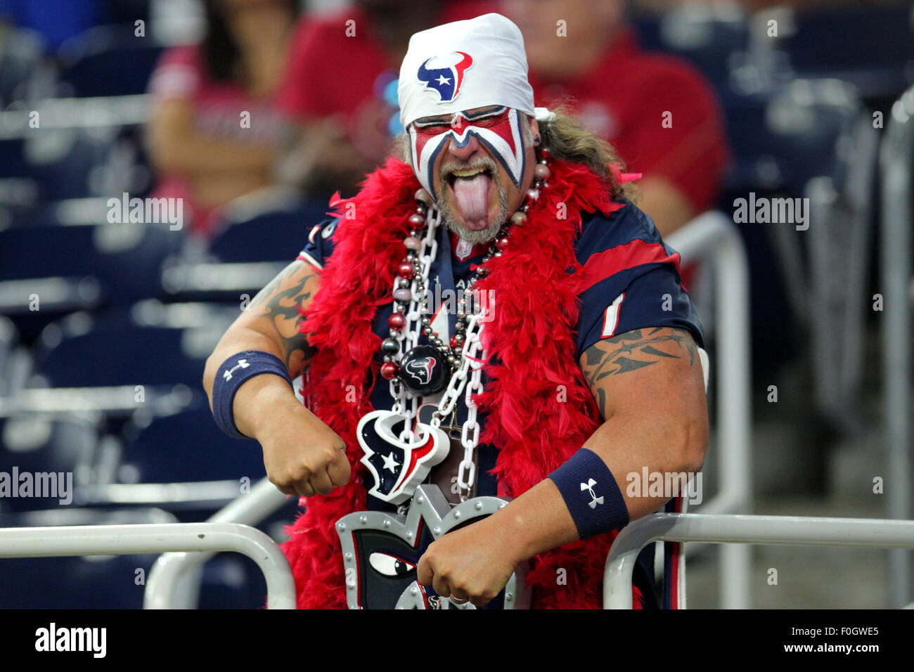 AUG 15 2015: A Houston Texans fan cheers on the action during the NFL ...