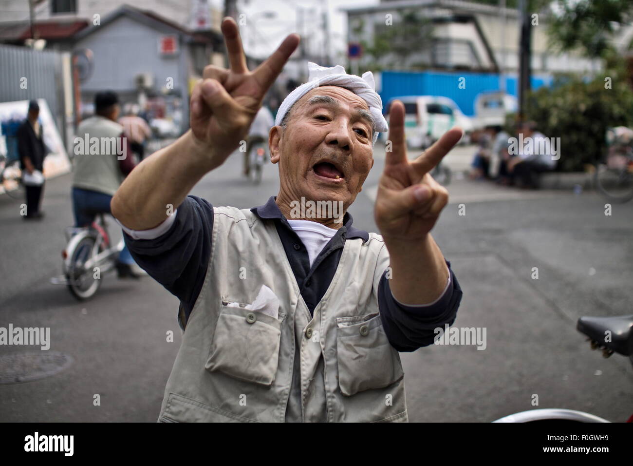 May 8, 2012 - Osaka, Japan - Man makes a funny face. City of Ghosts - A ...