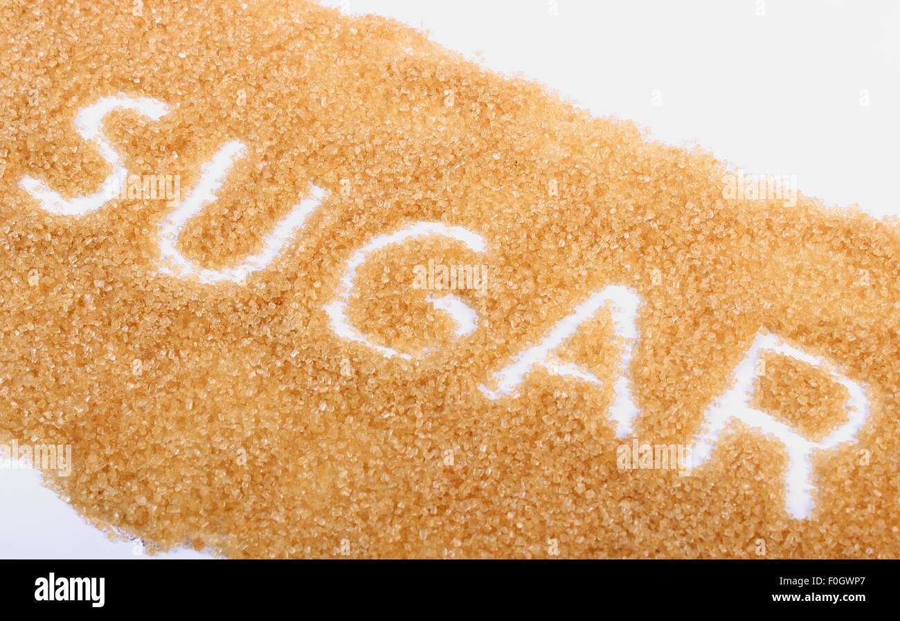 Word sugar written in granulated natural brown cane sugar Stock Photo ...