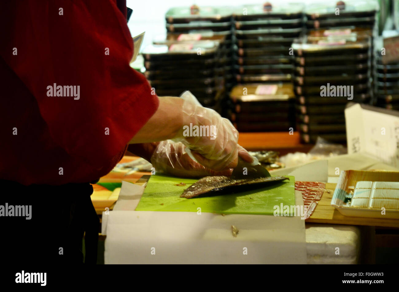 Chef slicing salmon preparing sushi hi-res stock photography and images ...