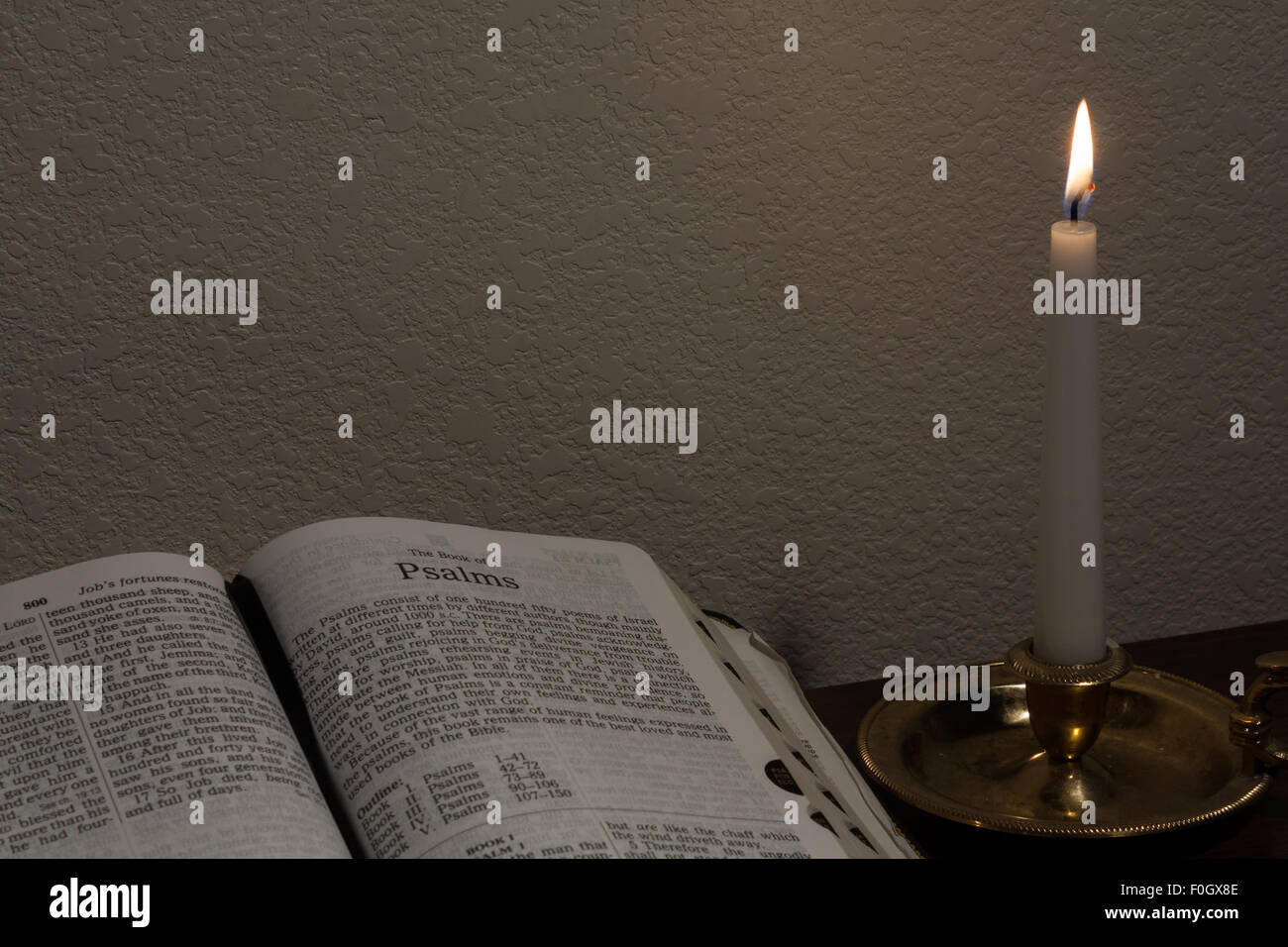 Open bible and candle hi-res stock photography and images - Alamy