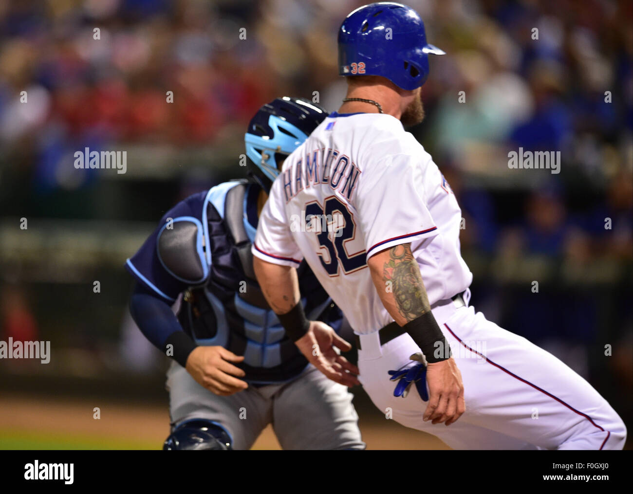 AUG 15, 2015: .Texas Rangers left fielder Josh Hamilton (32) scores ...