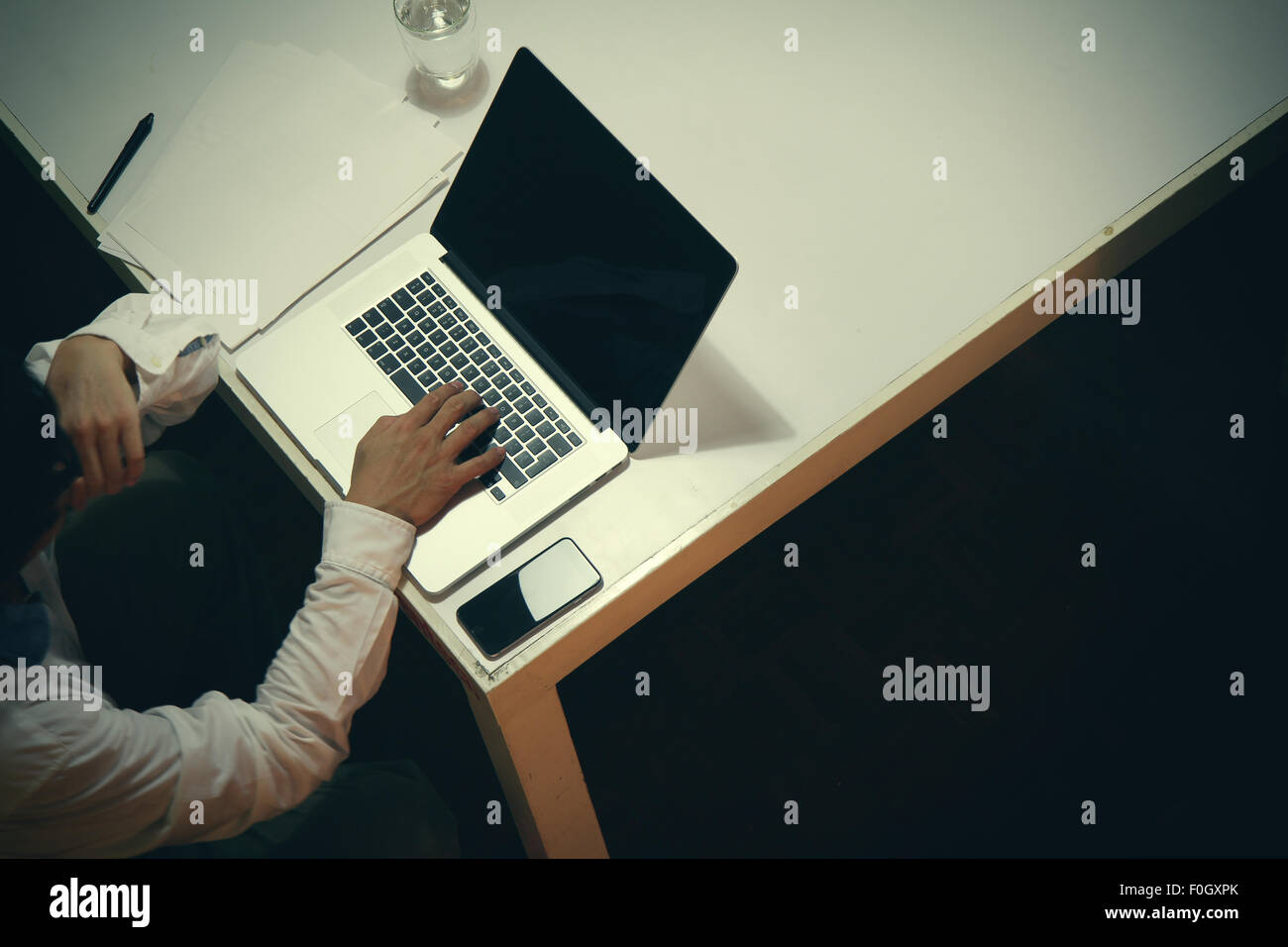 top view of man working with business documents on office table with ...