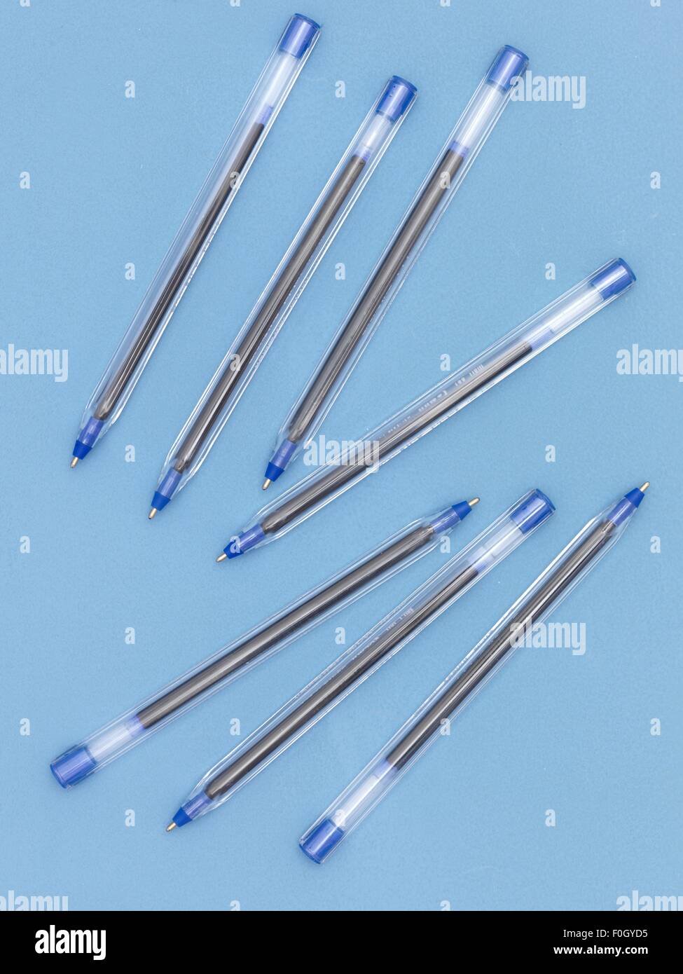 A close up shot of blue ink pens Stock Photo - Alamy