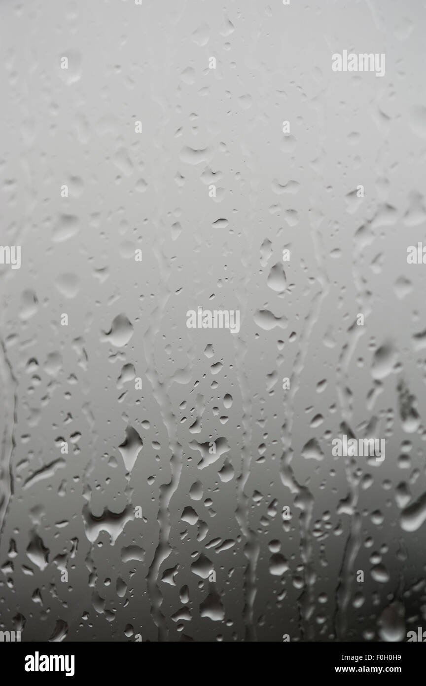 Rain drops running down window hi-res stock photography and images - Alamy