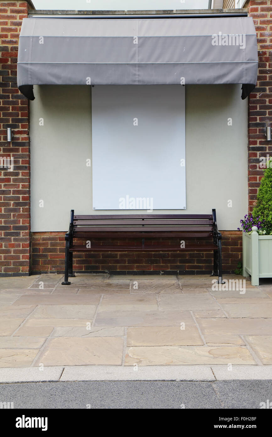 Shopfront vintage store front with canvas awnings and blank poster ...