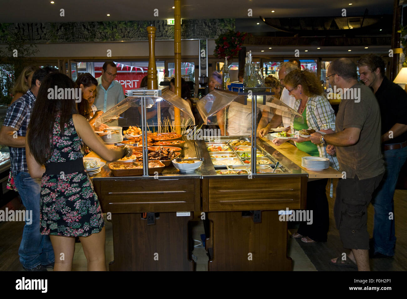 diners at restaurant buffet Stock Photo - Alamy
