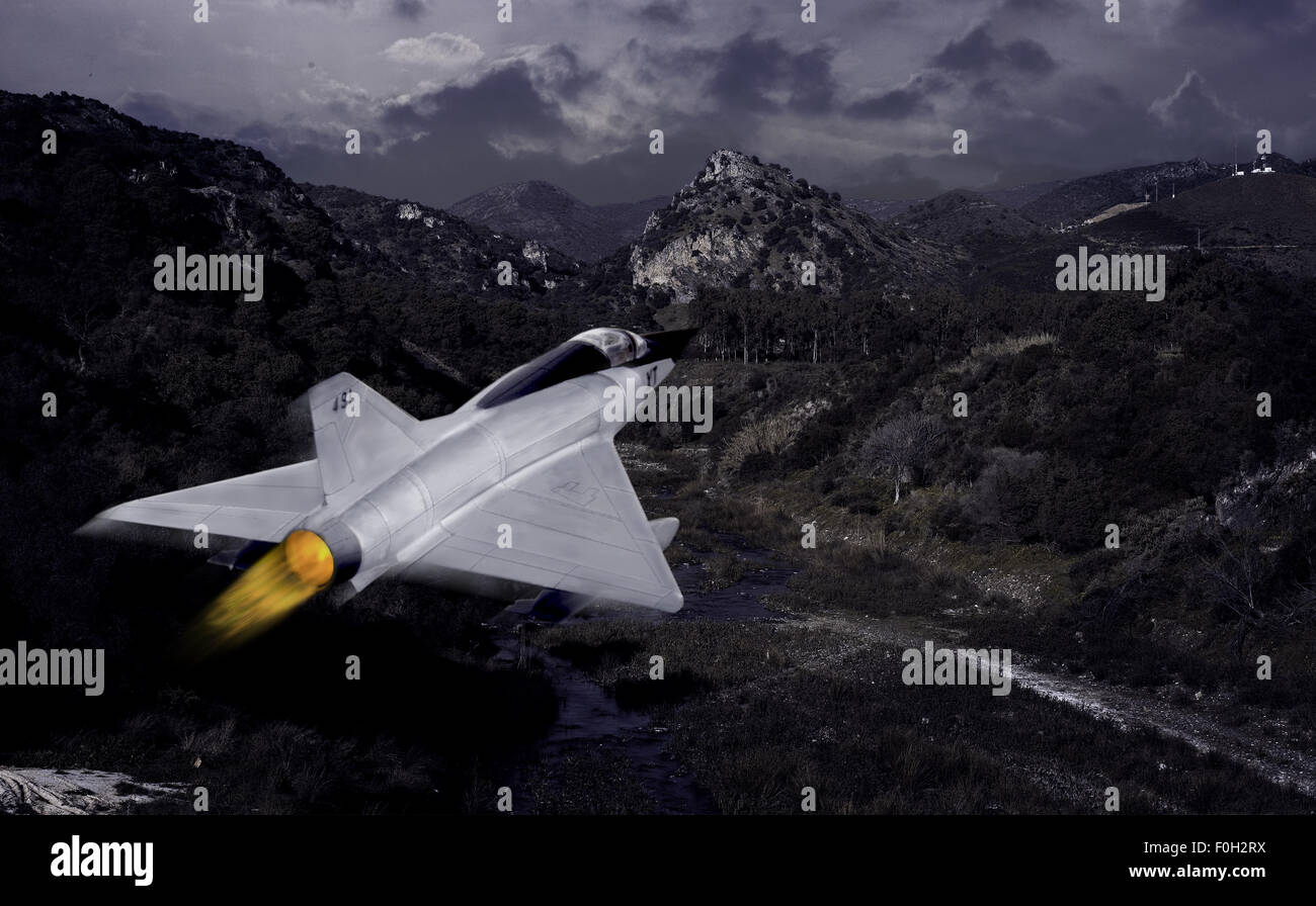 Fighter jet over landscape Stock Photo - Alamy