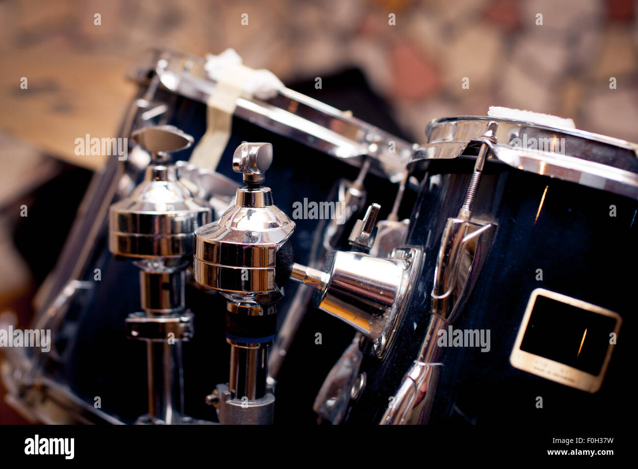 Drums detail in studio, tom parts in selective focus Stock Photo - Alamy