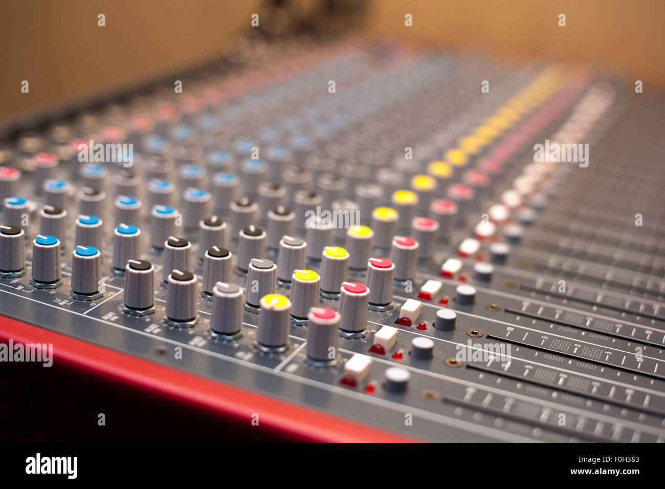 Music studio mixer detail of volume level in selective focus Stock ...