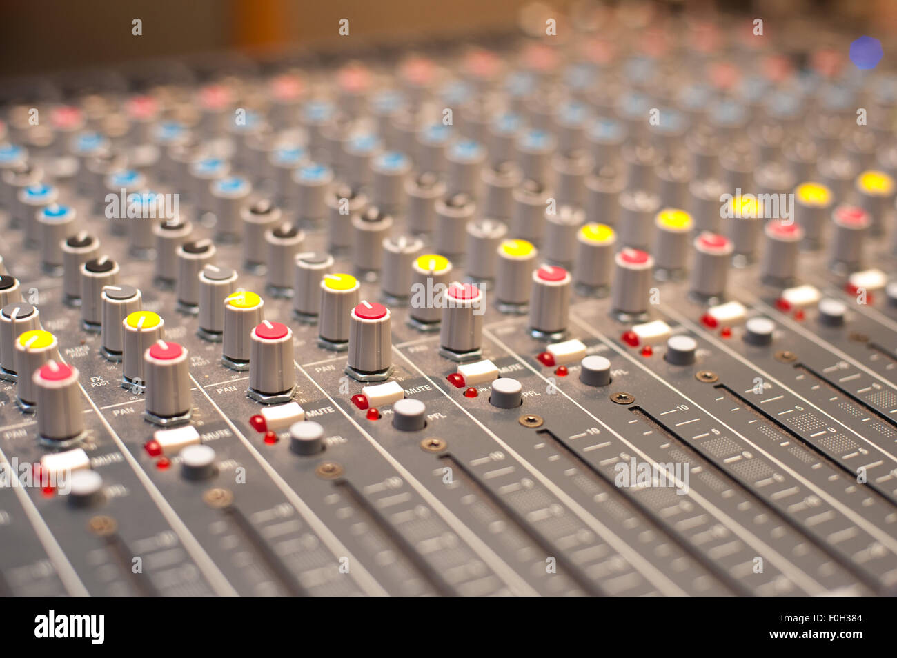Music studio mixer detail of volume level in selective focus Stock ...