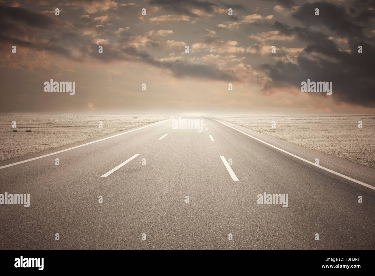 Long endless road Stock Photo - Alamy