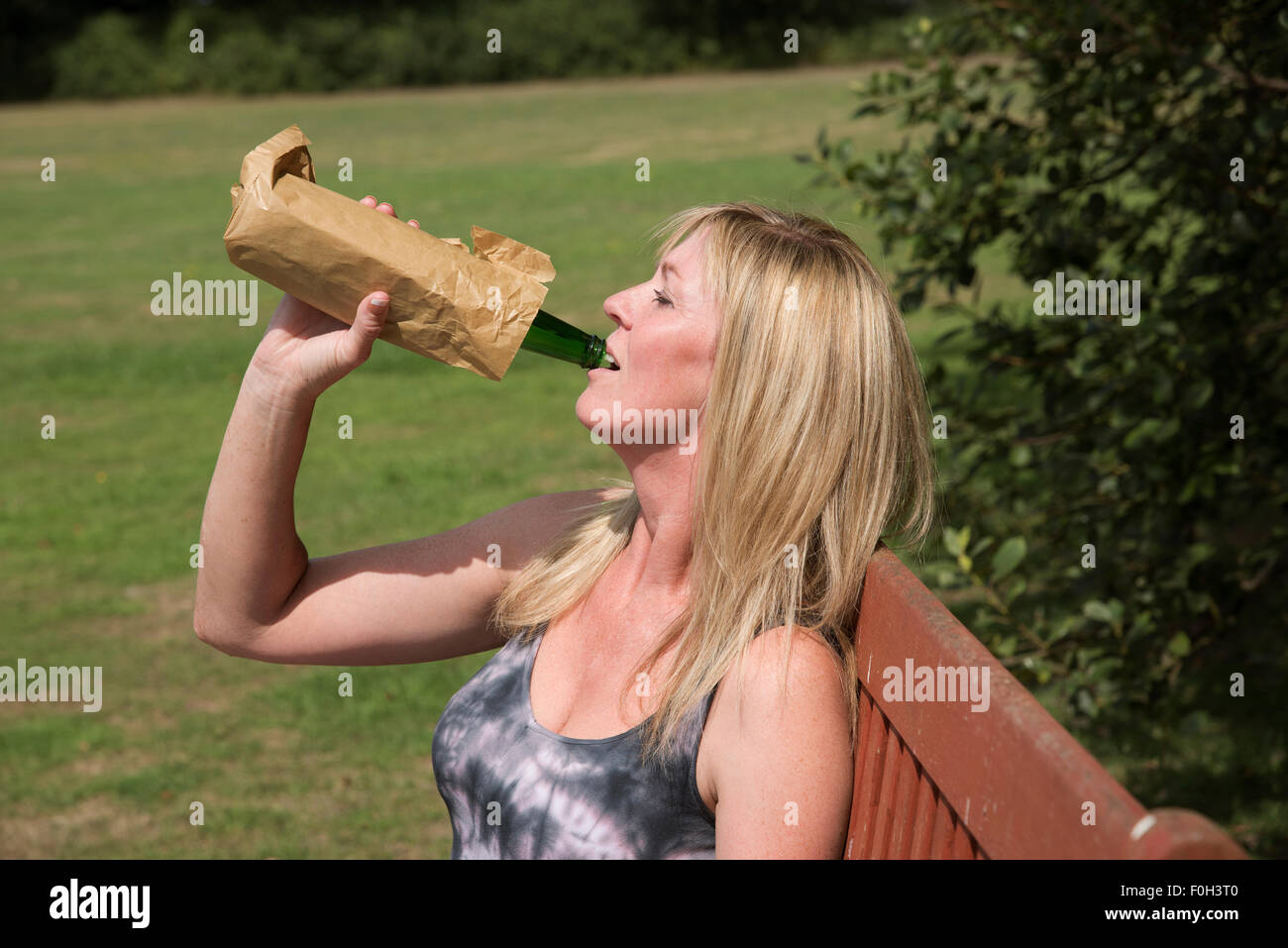 Woman Drinking Alcohol With Bottle In Brown Paper Bag In A Public Place Stock Photo Alamy woman-drinking-alcohol-with-bottle-in-brown-paper-bag-in-a-public-place-stock-photo-alamy