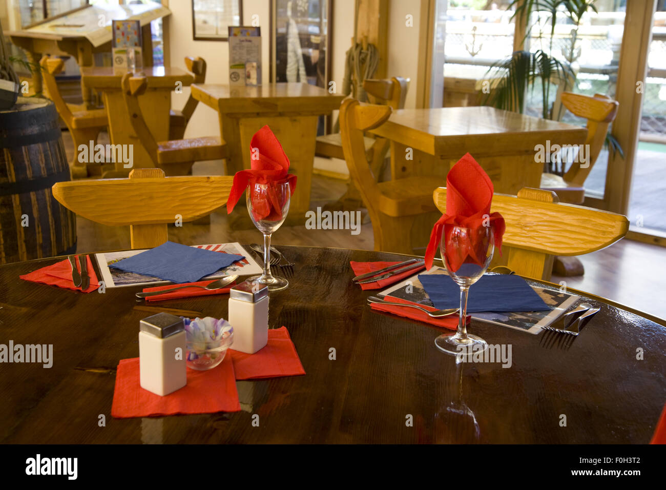 Restaurant colorful table setting Stock Photo - Alamy