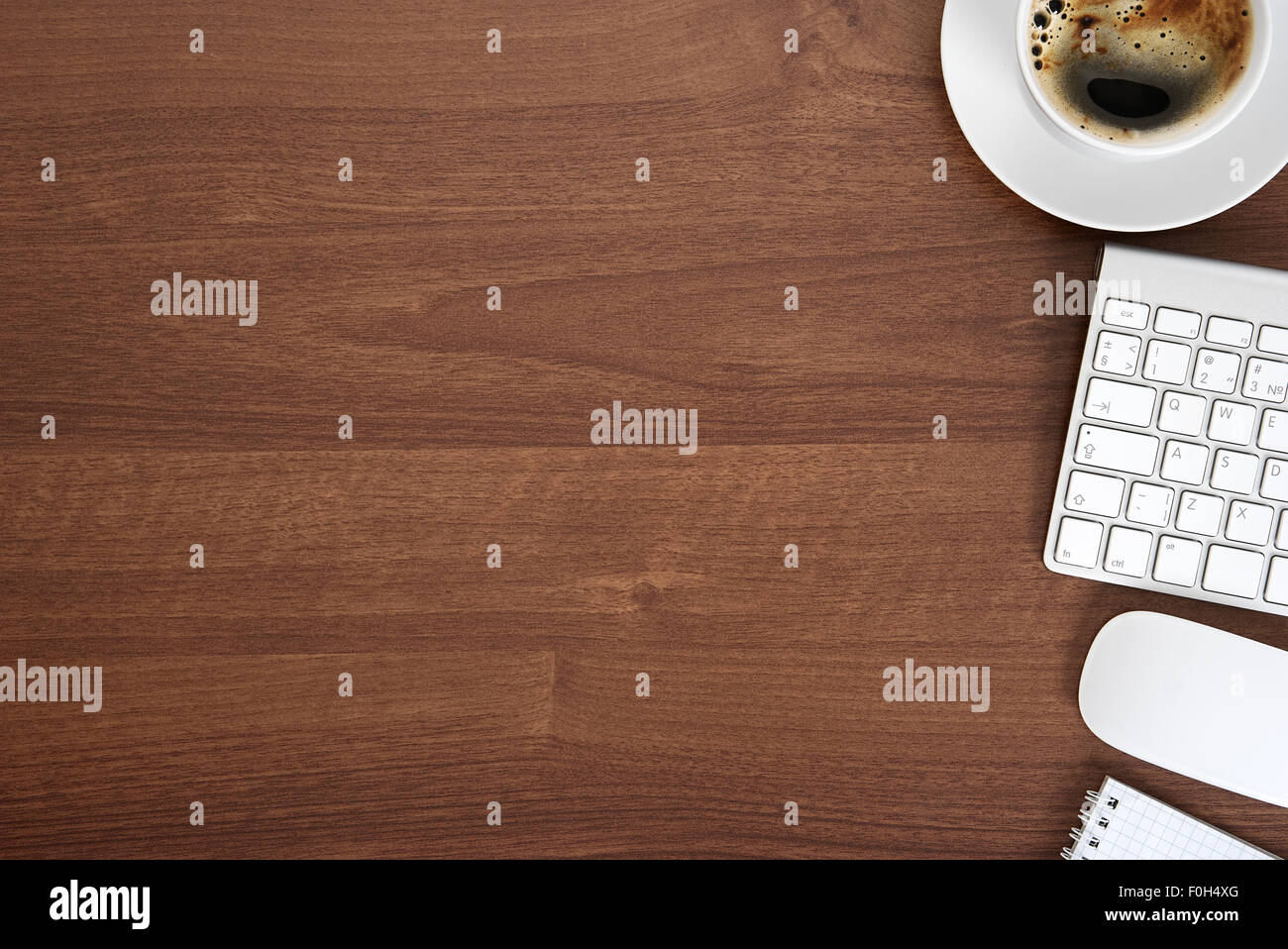 View from above with copy space, office table with notepad, keyboard ...