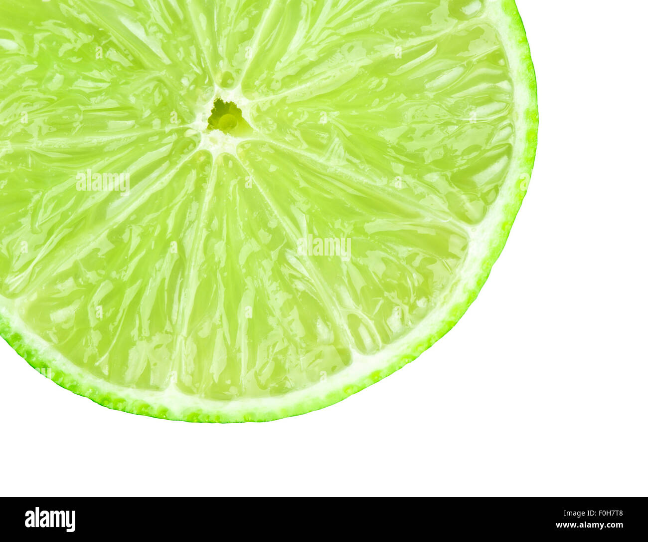 Fresh slice of lime on white background Stock Photo - Alamy
