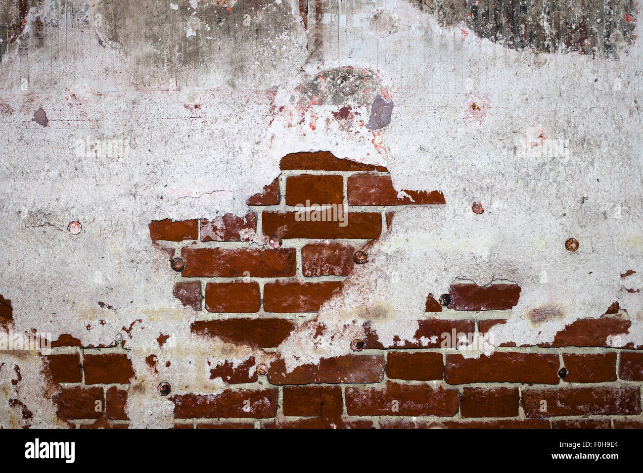 Old red brick and plaster wall texture Stock Photo - Alamy