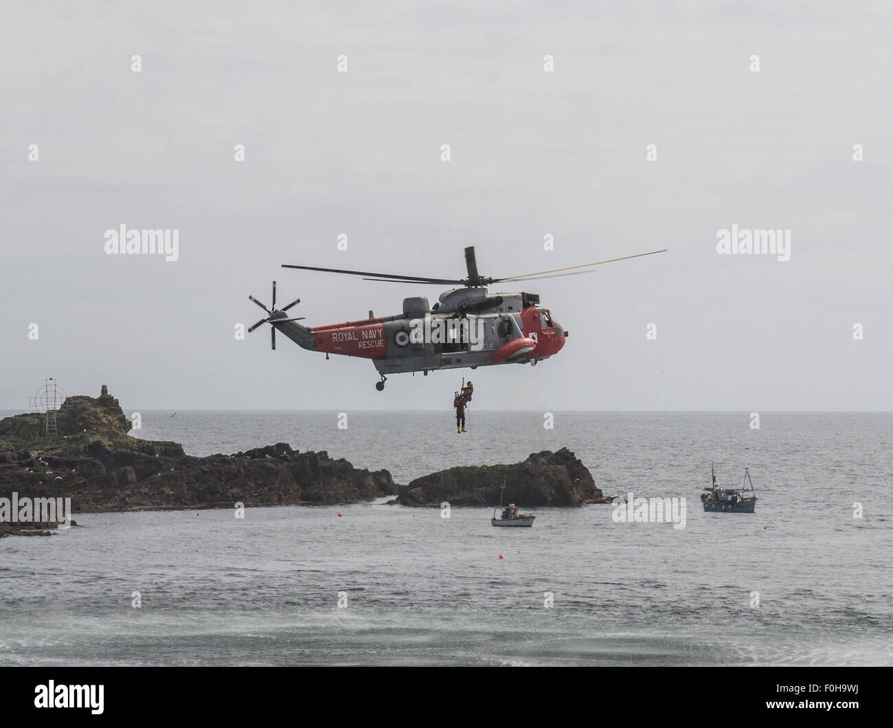 Mousehole, Cornwall, UK. 16th August 2015. RNLI lifeboat and RNAS ...