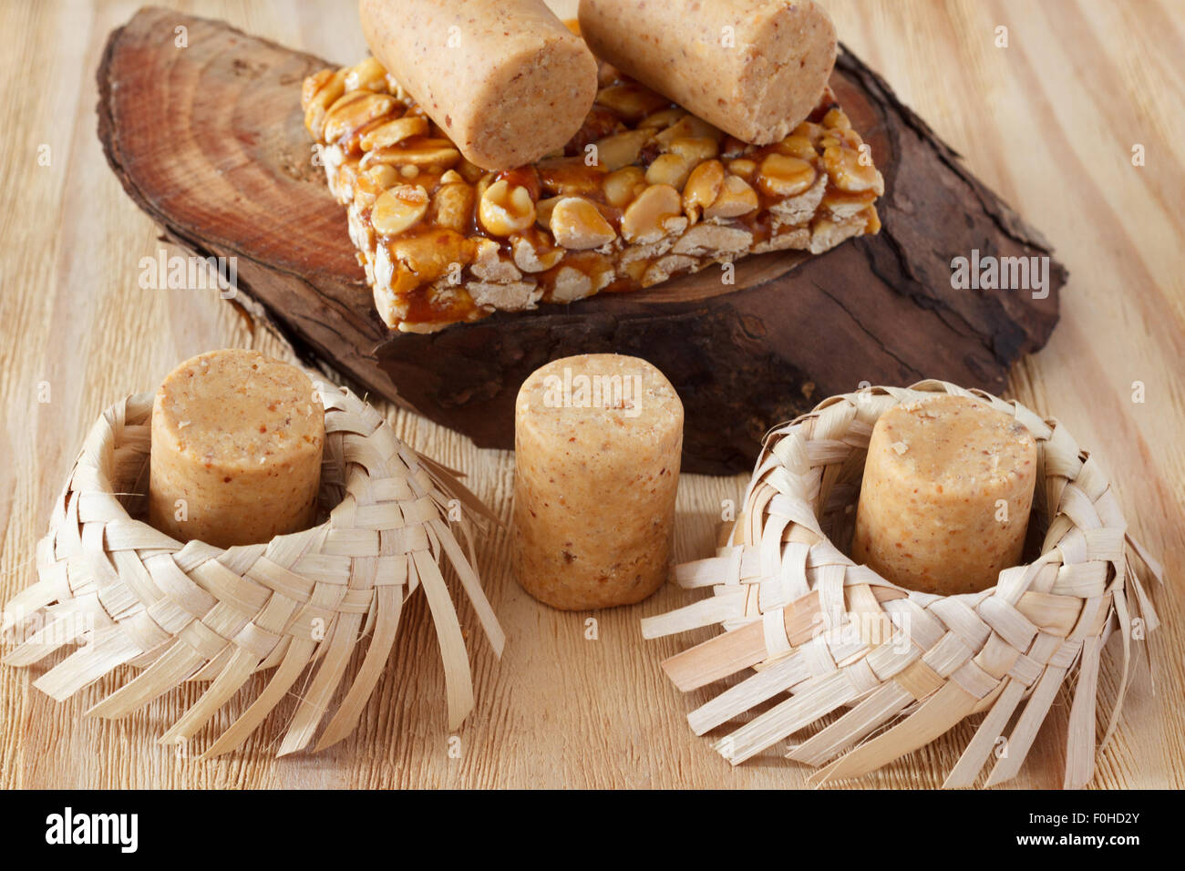 Pacoca - brazilian candy of ground peanut with wicker hat of festivity ...