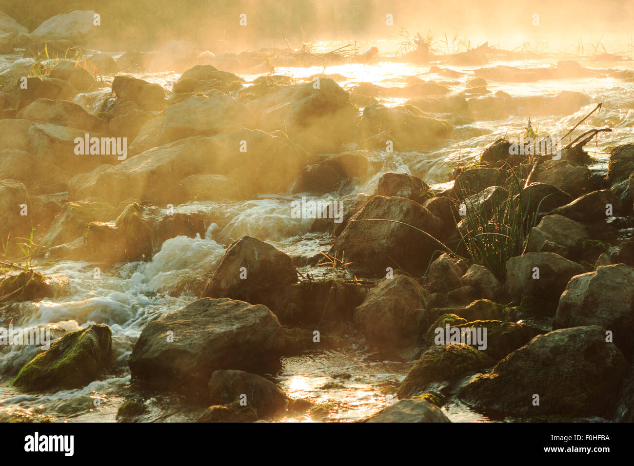 Dawn over Rushing river Stock Photo - Alamy