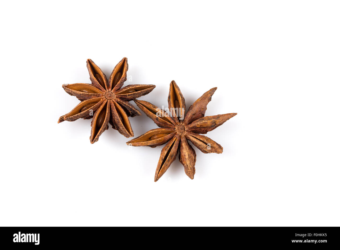 Stars of anise isolated on white background Stock Photo - Alamy