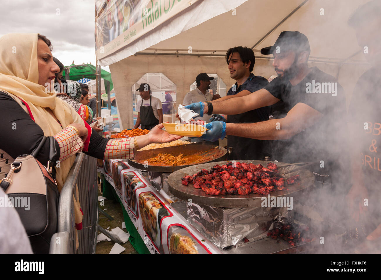 Kebab stall selling kebabs to customers at an Eid Mela event in ...
