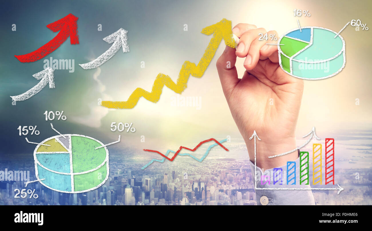 Rising arrows and graphs drawn with chalk sketches Stock Photo - Alamy