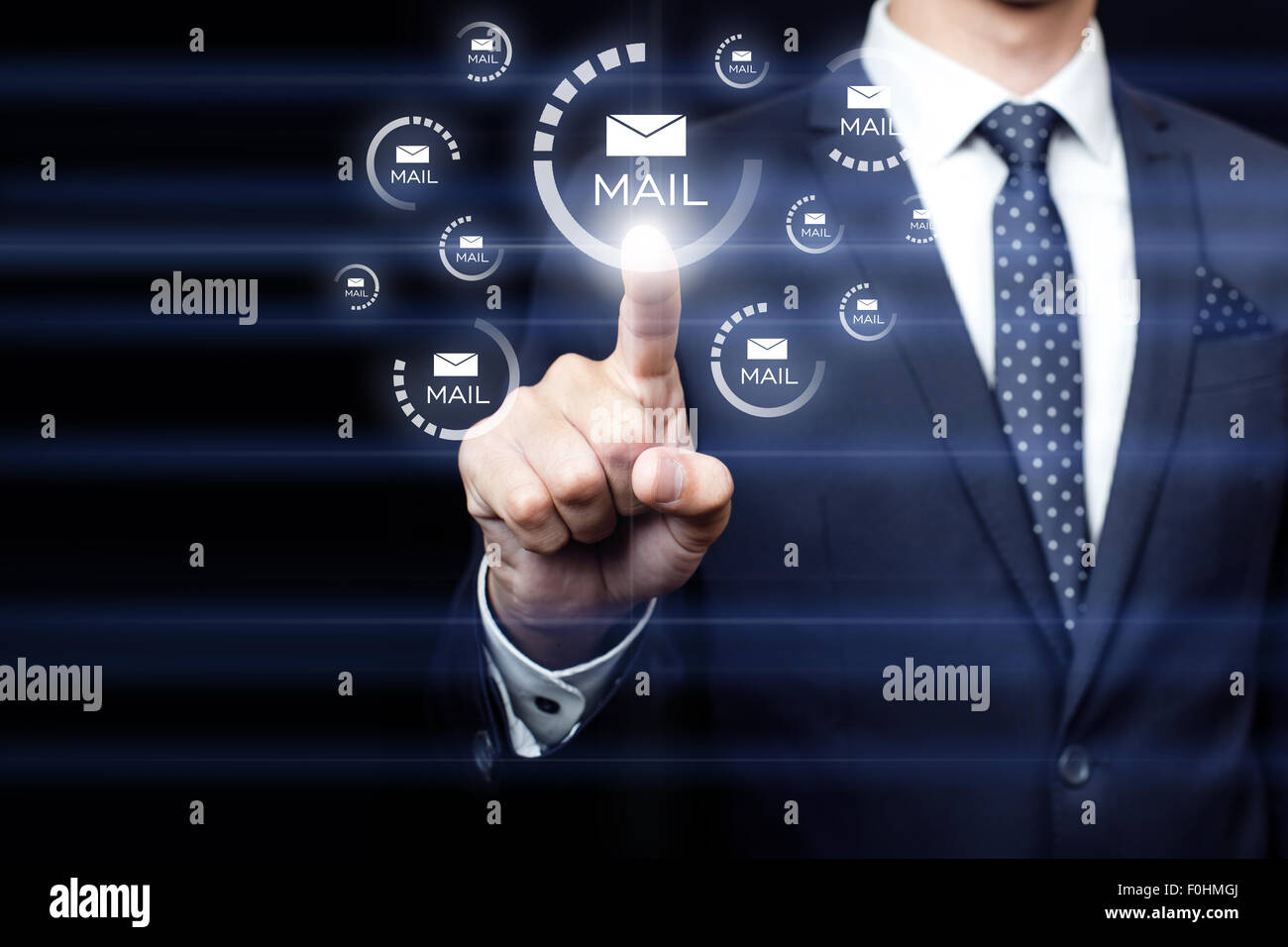 Businessman clicking on email icon Stock Photo - Alamy