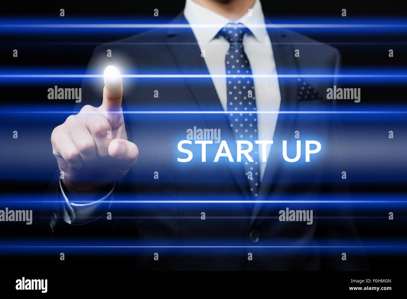 Businessman pressing virtual icons Stock Photo - Alamy