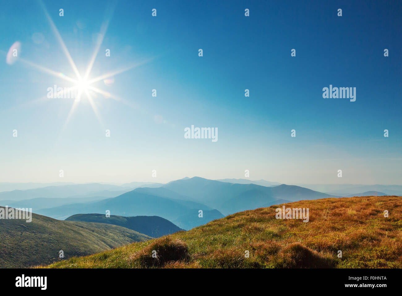 Bright blue mountains light sky hi-res stock photography and images - Alamy